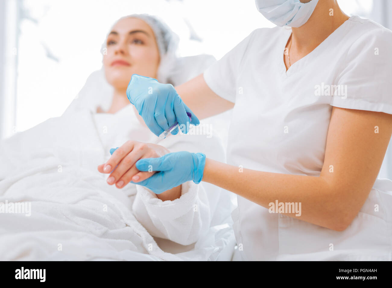 Hand given hi-res stock photography and images - Alamy