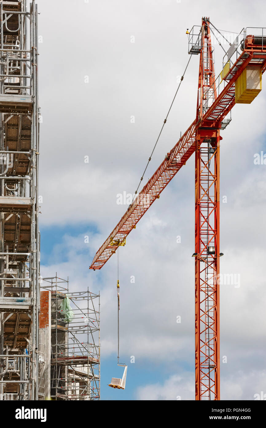 Building under construction. Crane machinery structure. Industry ...