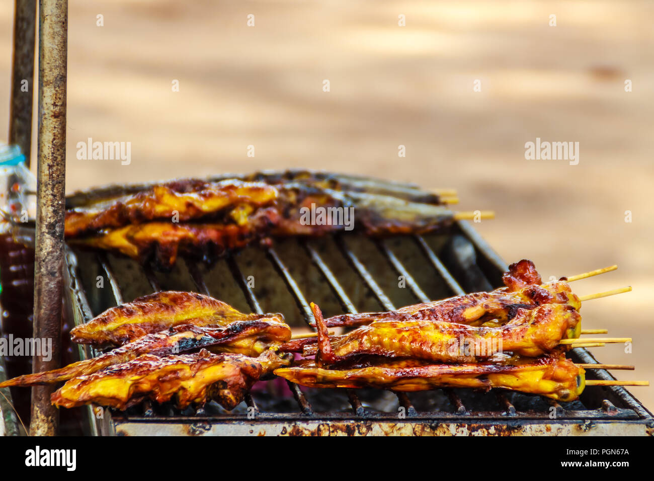 Grilled beach food for sale including fishes, chicken, sausages at ...