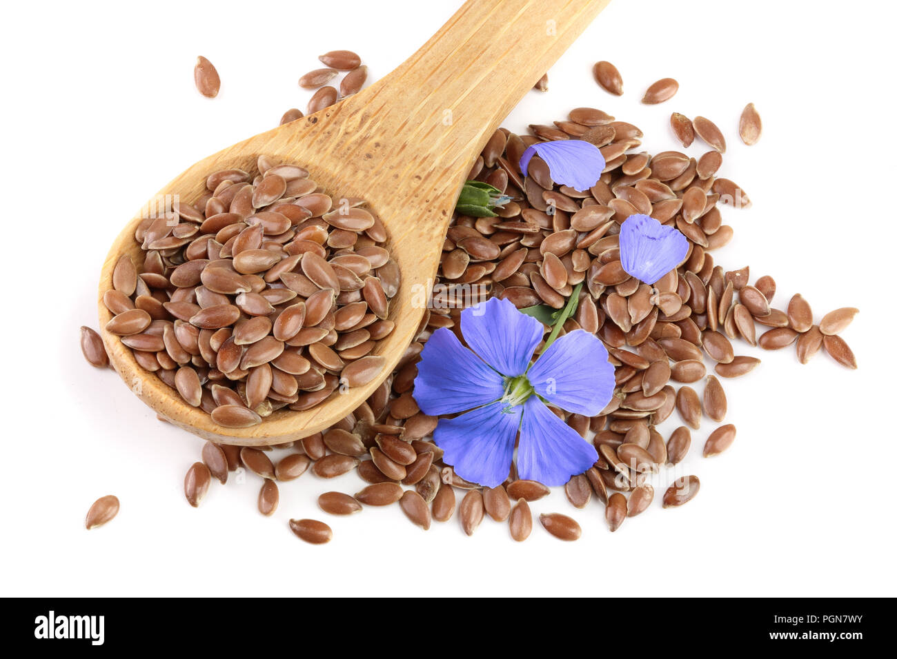 flax seeds in wooden spoon with flower isolated on white background Stock Photo - Alamy