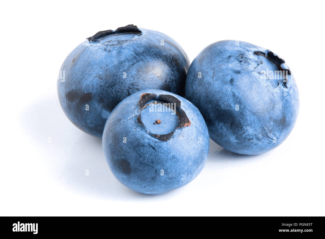 three fresh blueberry isolated on white background Stock Photo - Alamy