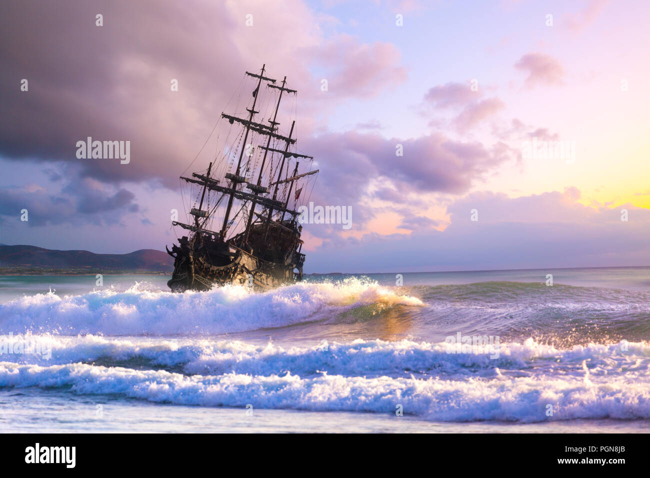 Old ship silhouette in sunset scenery Stock Photo - Alamy