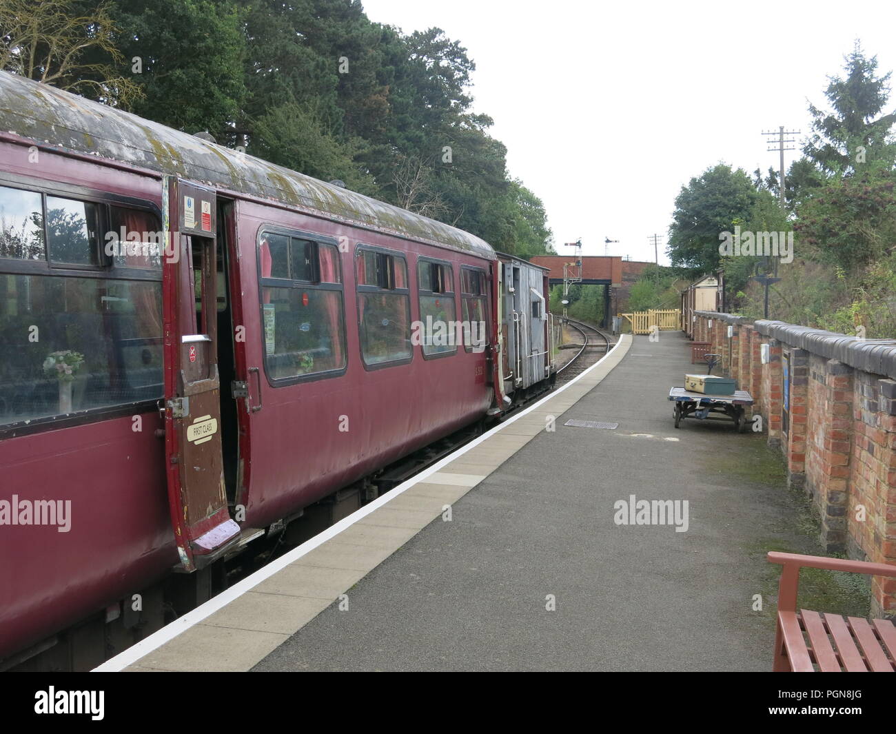 Train carriages alongside the platform at the Northampton & Lamport ...