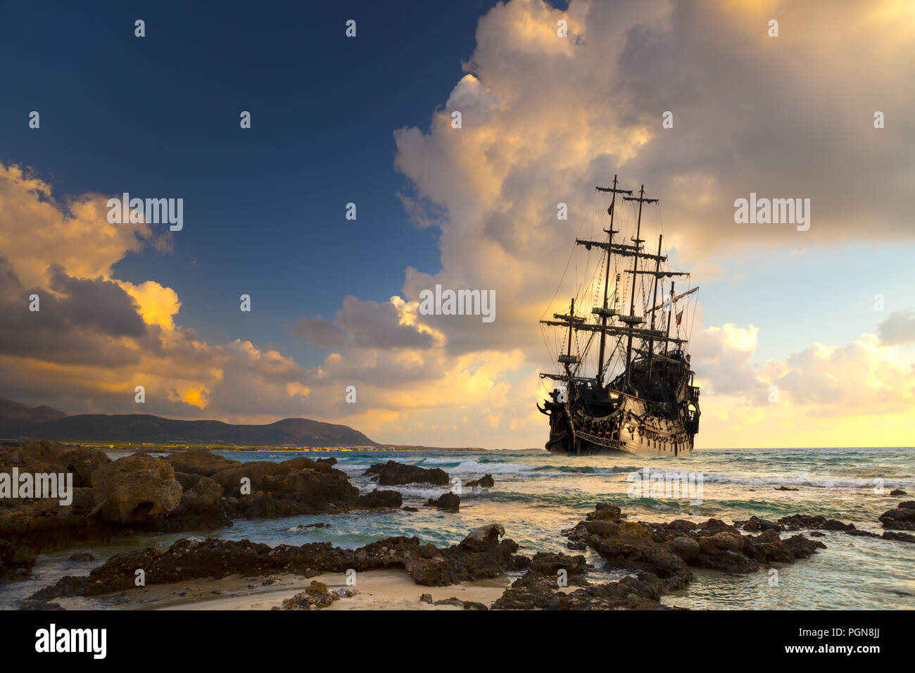 Old ship silhouette in sunset scenery Stock Photo - Alamy
