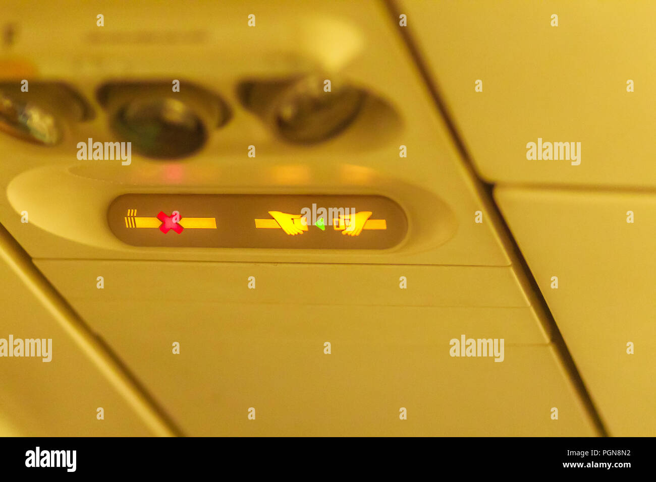No Smoking and Fasten Seat belt Sign Inside an Airplane. Fasten seat ...