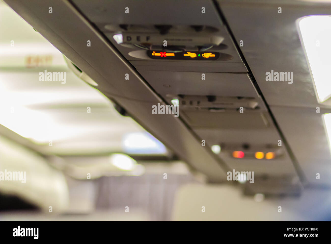 No Smoking and Fasten Seat belt Sign Inside an Airplane. Fasten seat ...
