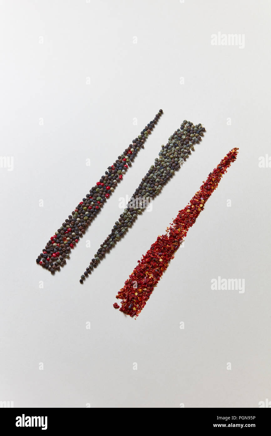 Colorful geometric food pattern of species various kinds of pepper on a ...