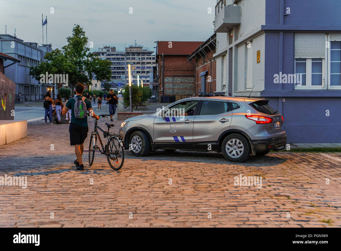 Hellenic Coast Guard patrol car. Land vehicle with blue siren and ...