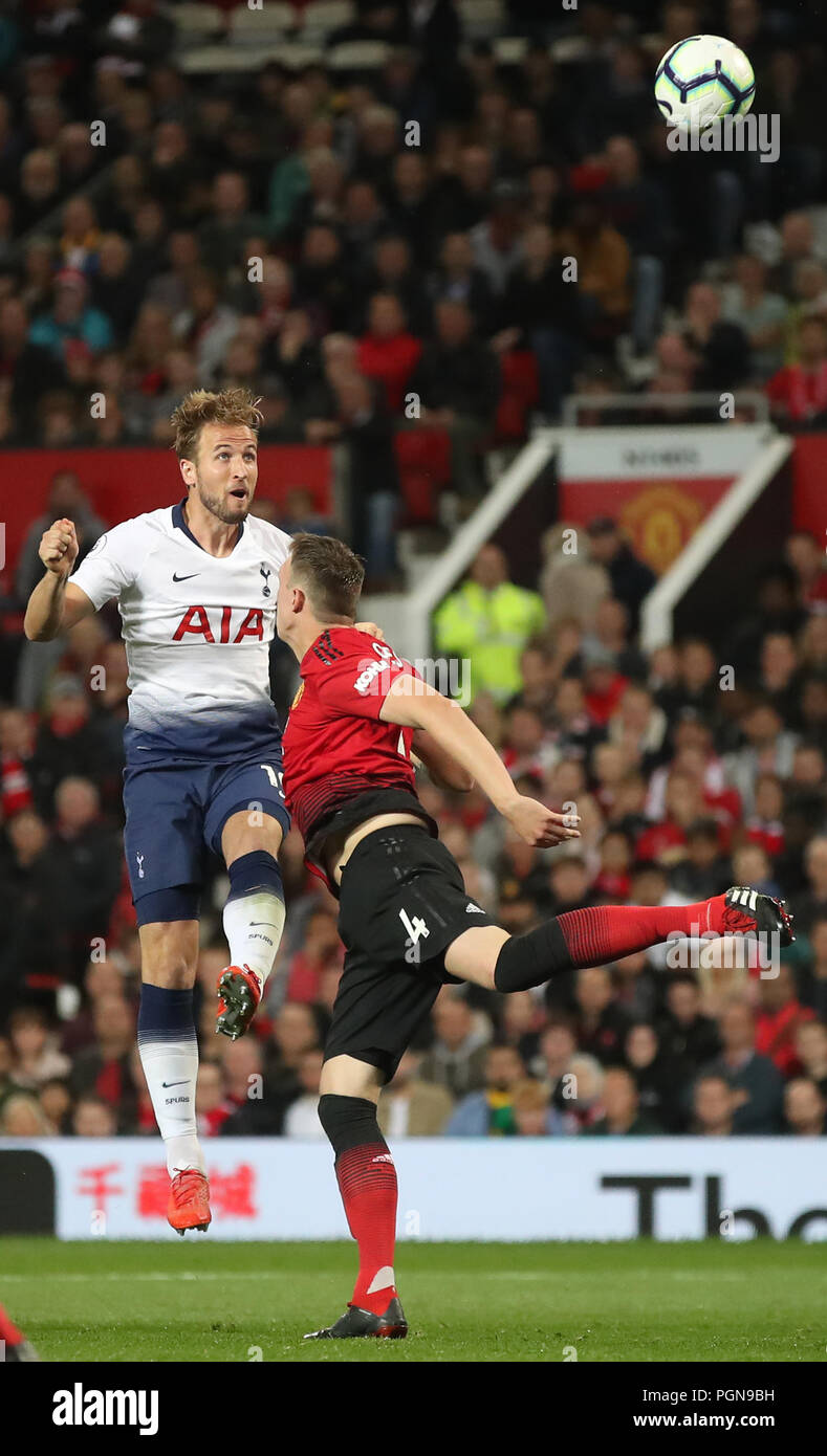 Tottenham Hotspur's Harry Kane (left) scores his side's first goal of ...