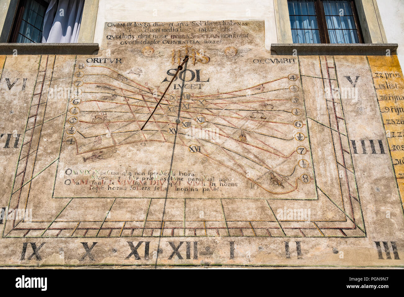 A medieval sundial on the facade of the Hotel Růže in Český Krumlov ...