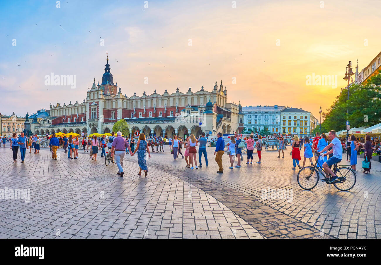 KRAKOW, POLAND - JUNE 11, 2018: Mariacki Plac during evening time is ...