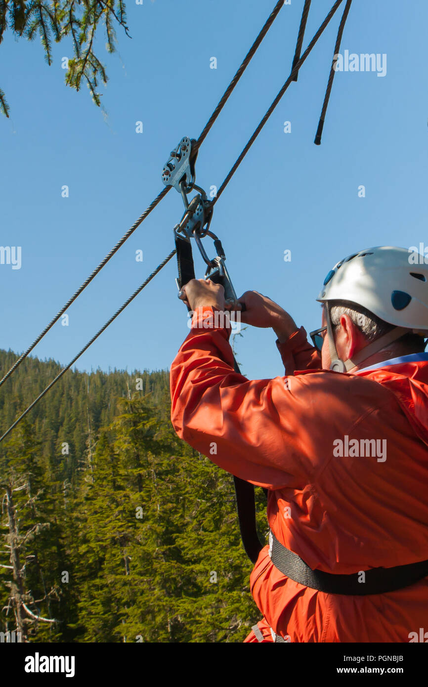 Person ziplining hi-res stock photography and images - Alamy
