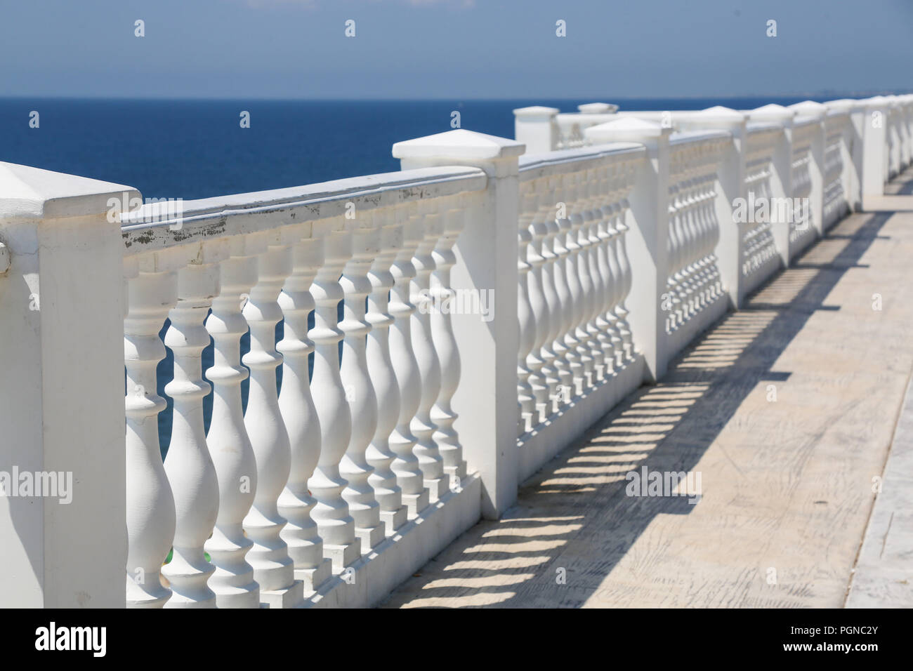 Baluster beach. White columns overlooking the sea. View of white ...