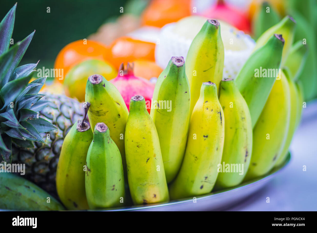 Set of fresh tropical fruits including banana, orange, pineapple, fresh ...