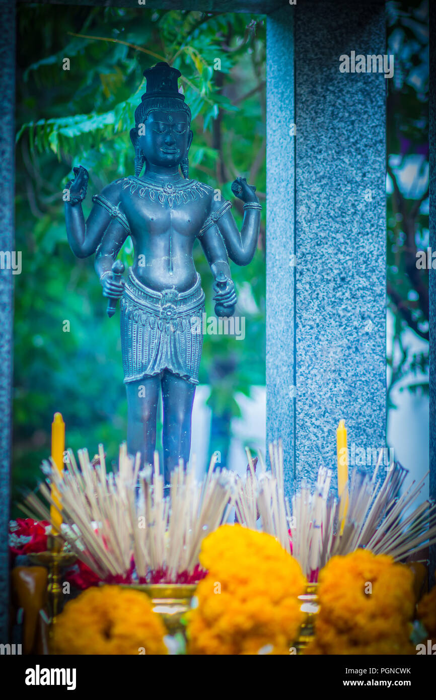 Brahma worship ceremony with marigold wheel flower and incense stick ...
