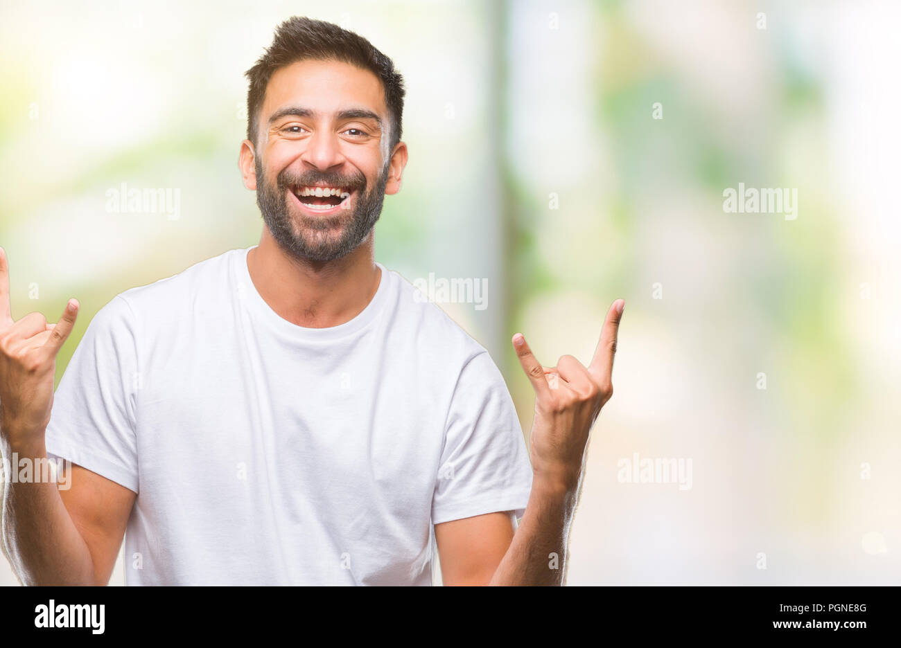 Adult hispanic man over isolated background shouting with crazy ...