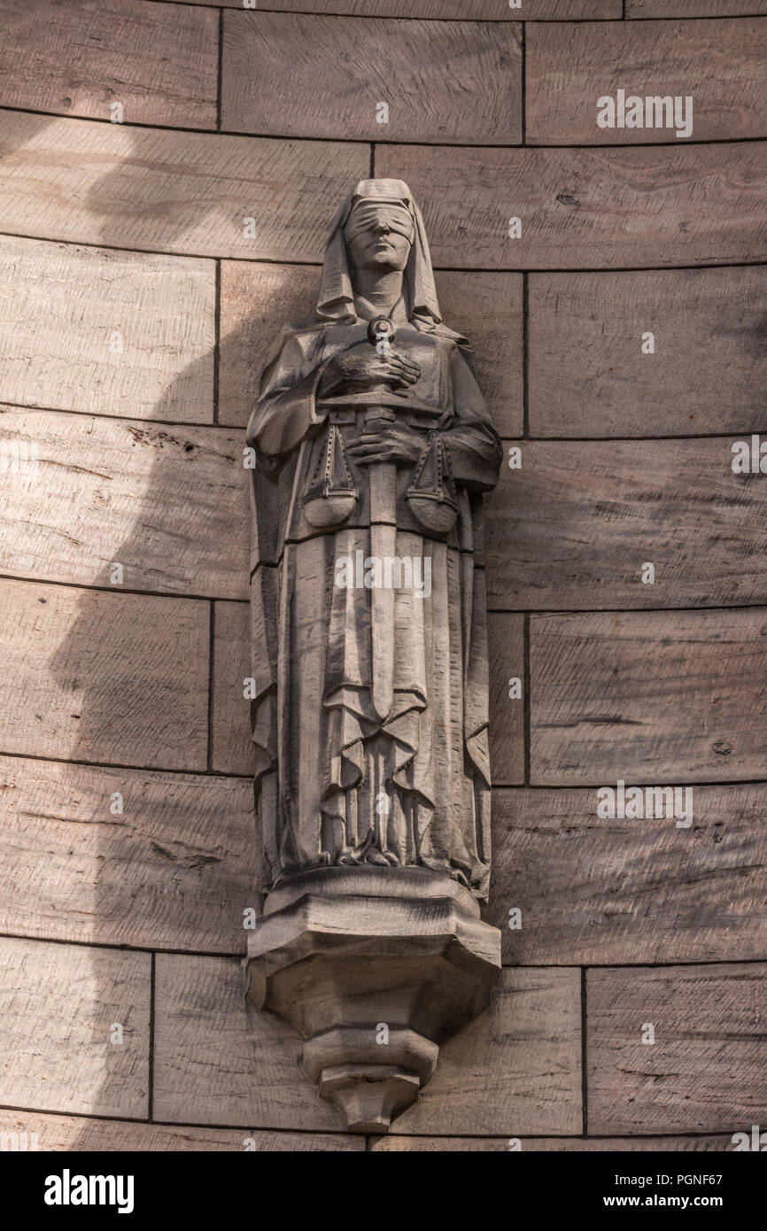 Edinburgh, Scotland, UK - June 14, 2012: Brown stone blindfolded lady ...