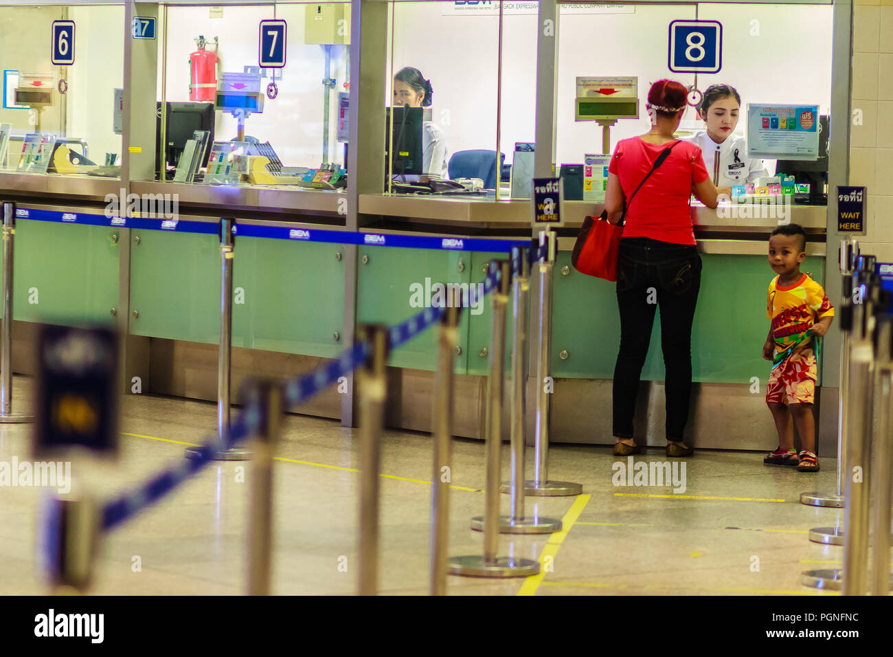 Bangkok, Thailand - February 22, 2017: Unidentified passenger buying ...