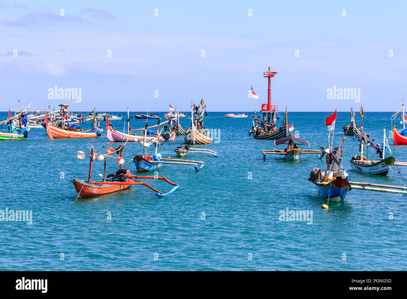 Traditional Balinese fishing boats off Jimbaran beach. They are known ...