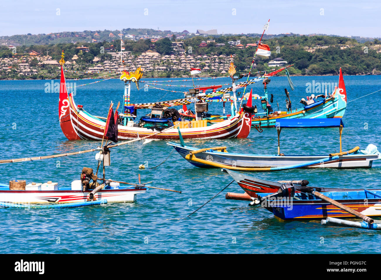 Traditional Balinese fishing boats off Jimbaran beach. They are known ...