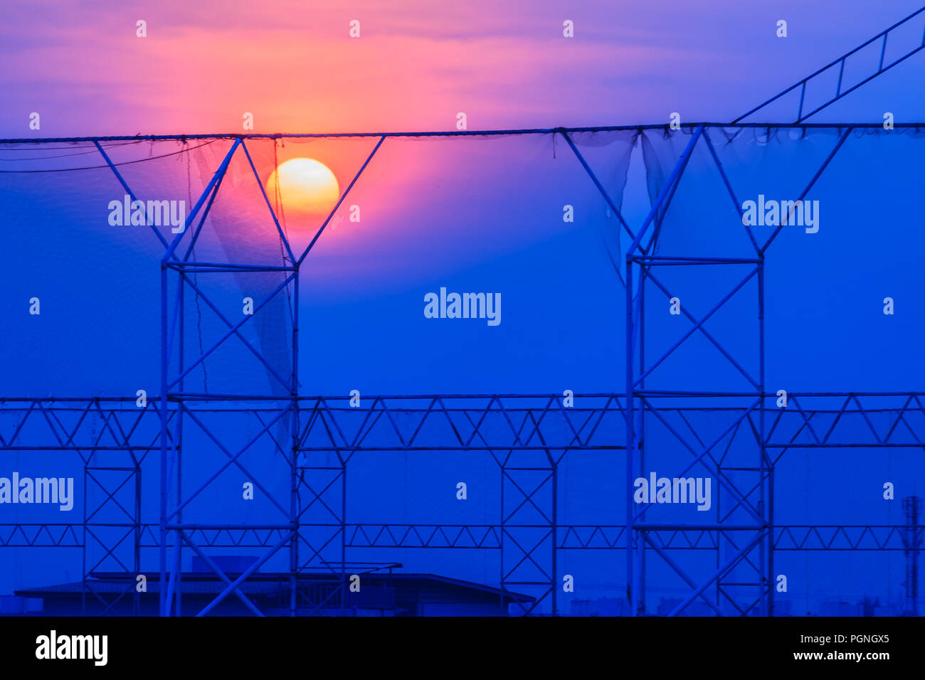 Golf driving range during sunset/ sunrise with colorful sky background ...