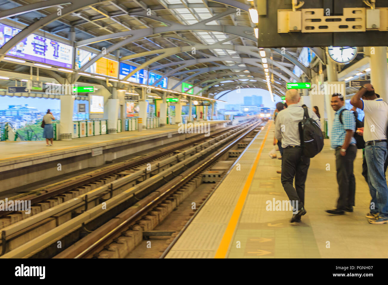 Bangkok, Thailand - February 28, 2017: Passengers wait for BTS Skytrain ...