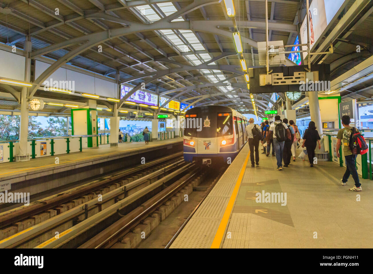 Bangkok, Thailand - February 28, 2017: Passengers wait for BTS Skytrain ...