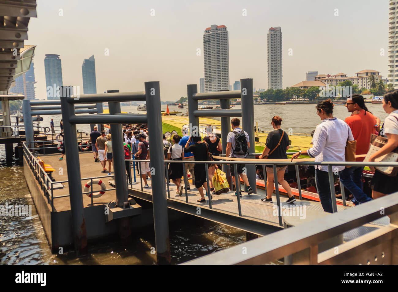 Bangkok, Thailand - March 2, 2017: Passengers at Sathorn pier, a ...