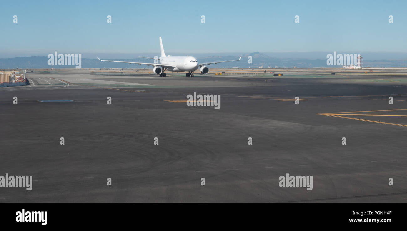 Commercial Airplane in the Runway About to Take off Stock Photo - Alamy