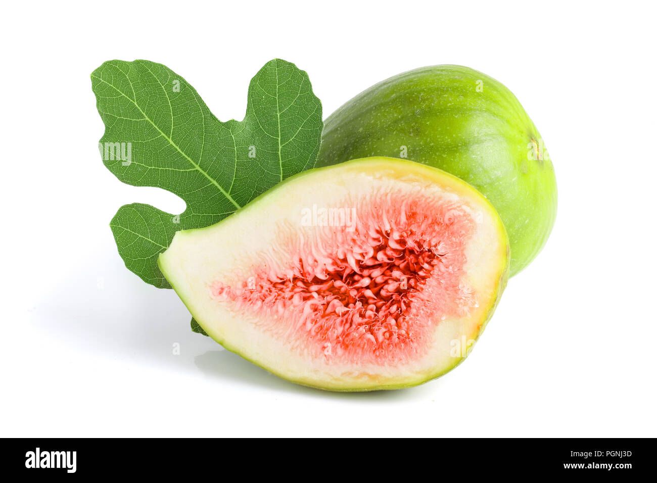 Ripe green fig fruit and half with leaf isolated on white background ...