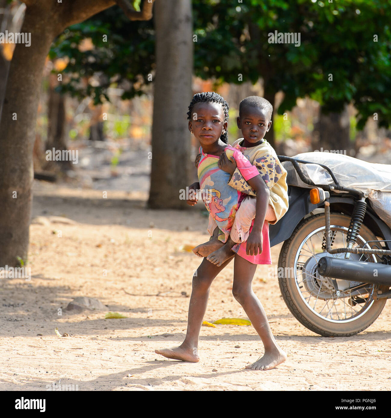 African girl carries baby hi-res stock photography and images - Alamy