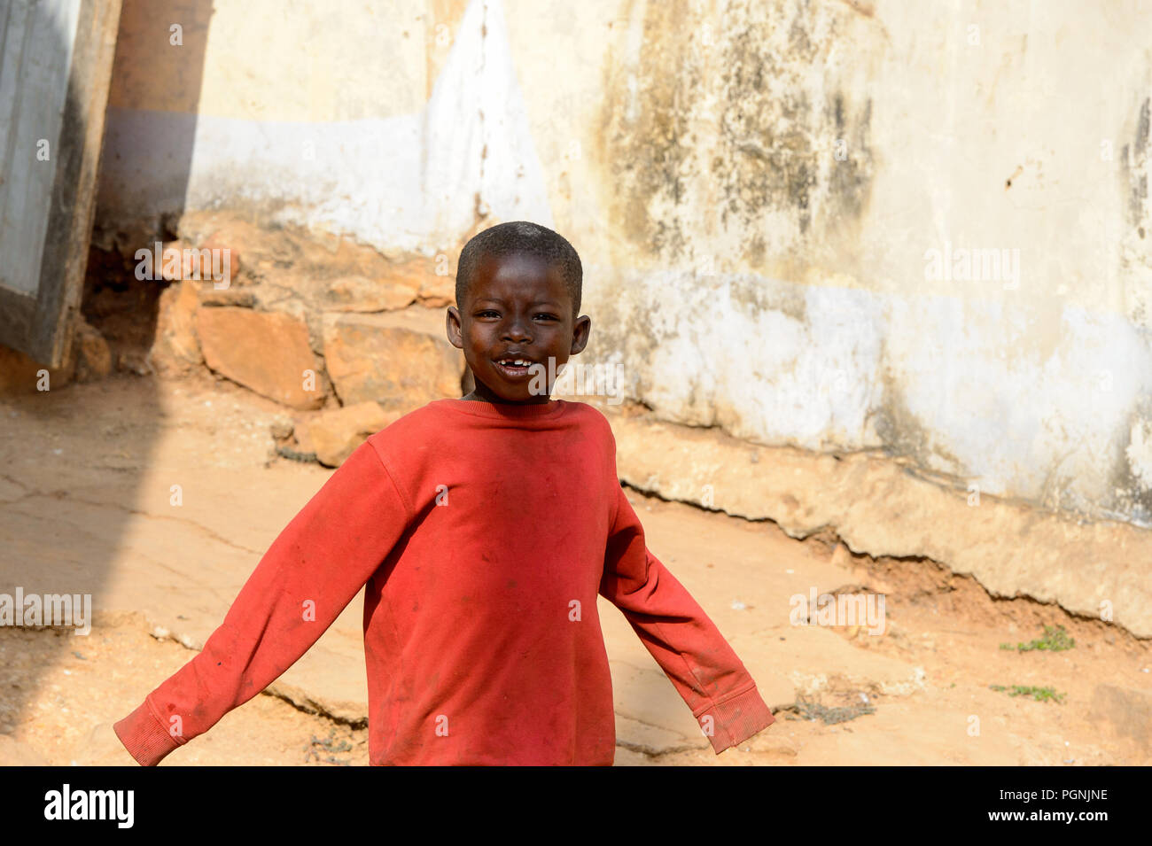 KARA REG., TOGO - JAN 14, 2017: Unidentified Konkomba little boy in red ...