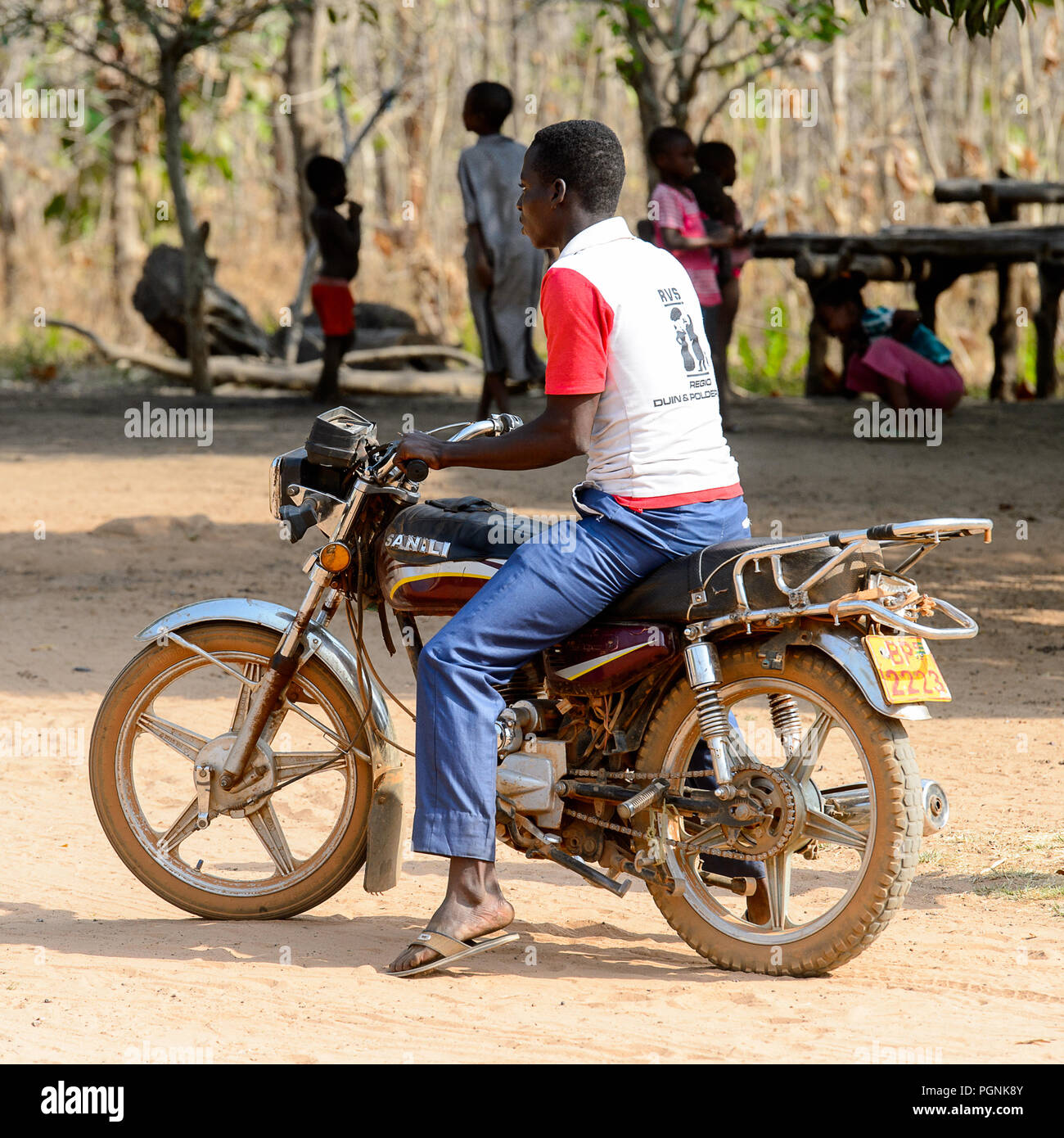 KARA REG., TOGO - JAN 14, 2017: Unidentified Konkomba man rides a ...