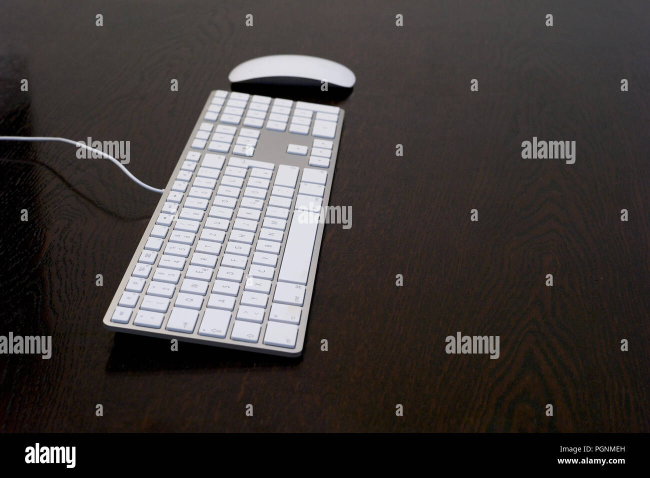 Desk with Mouse and Keyboard Stock Photo - Alamy