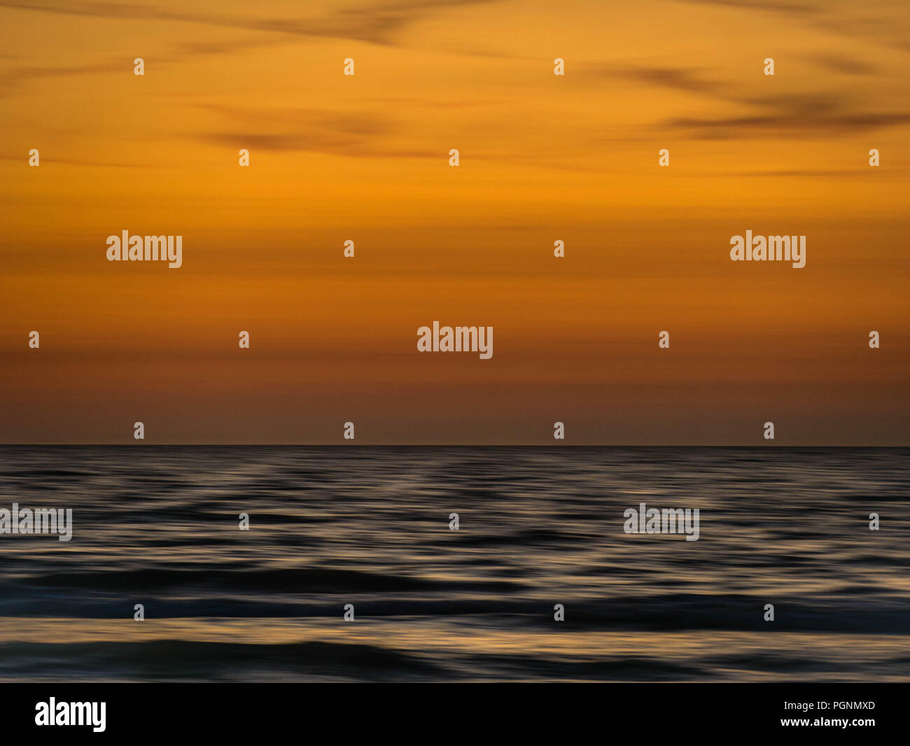Abstract sunset with blurry waves in motion Stock Photo - Alamy