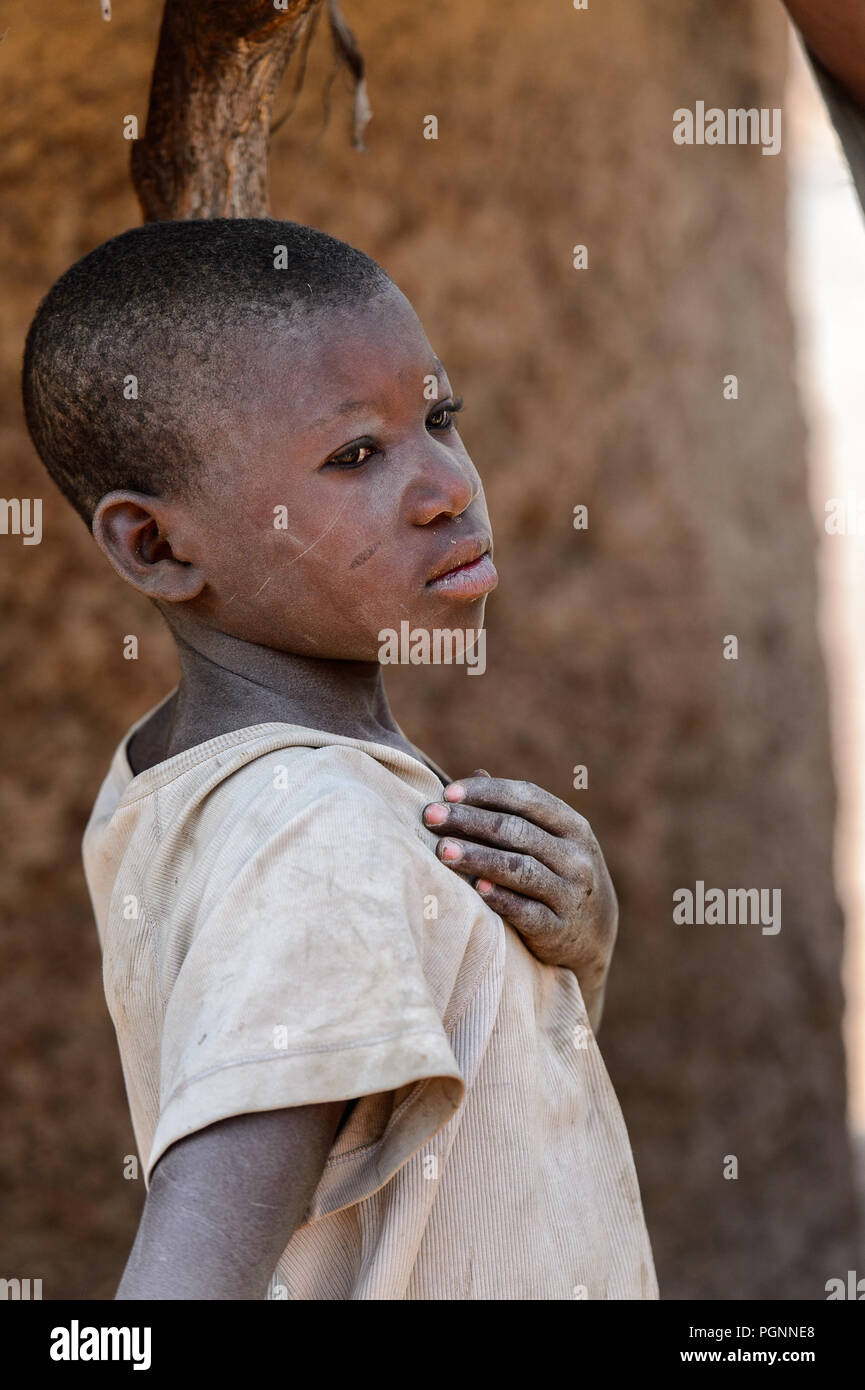 KARA REG., TOGO - JAN 14, 2017: Unidentified Konkomba little boy looks ...