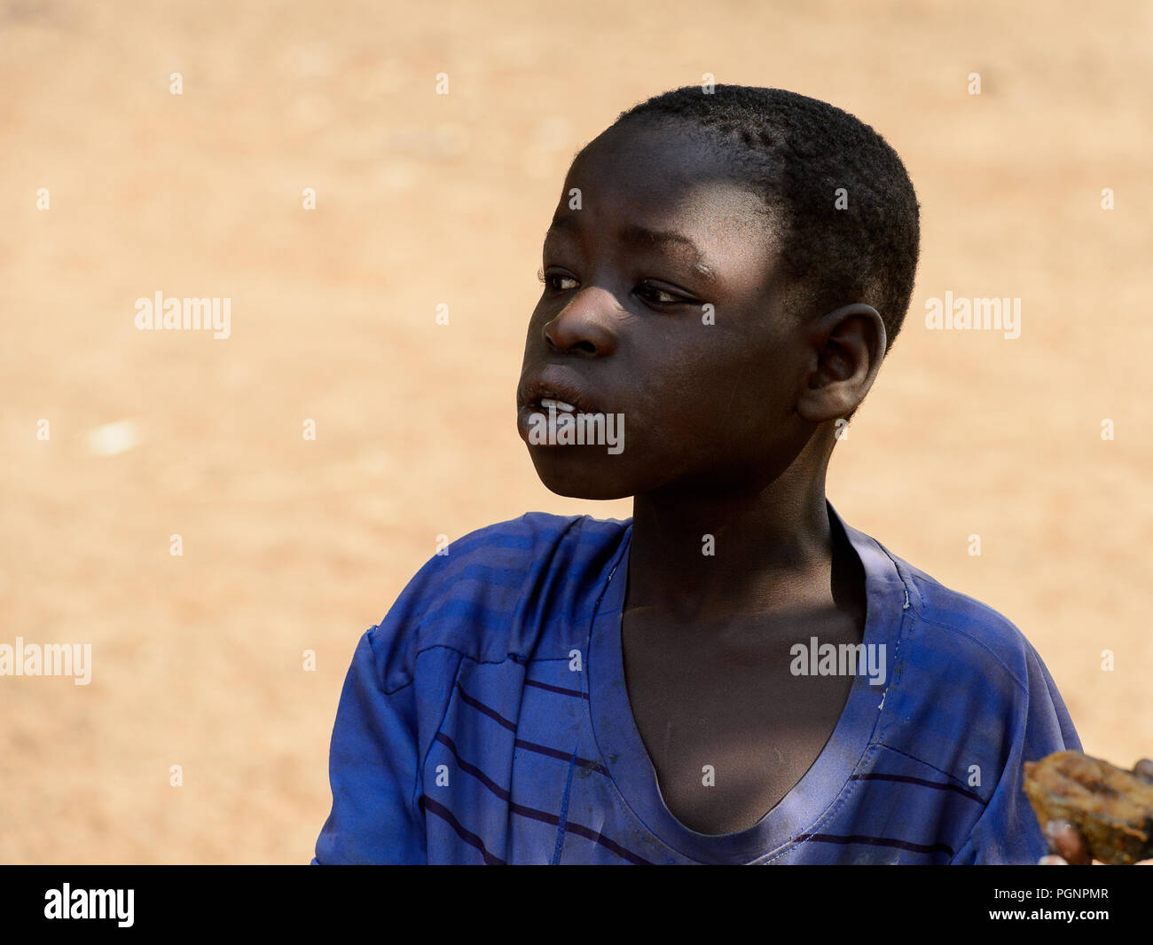 GHANI, GHANA - JAN 14, 2017: Unidentified Ghanaian boy in blue shirt ...
