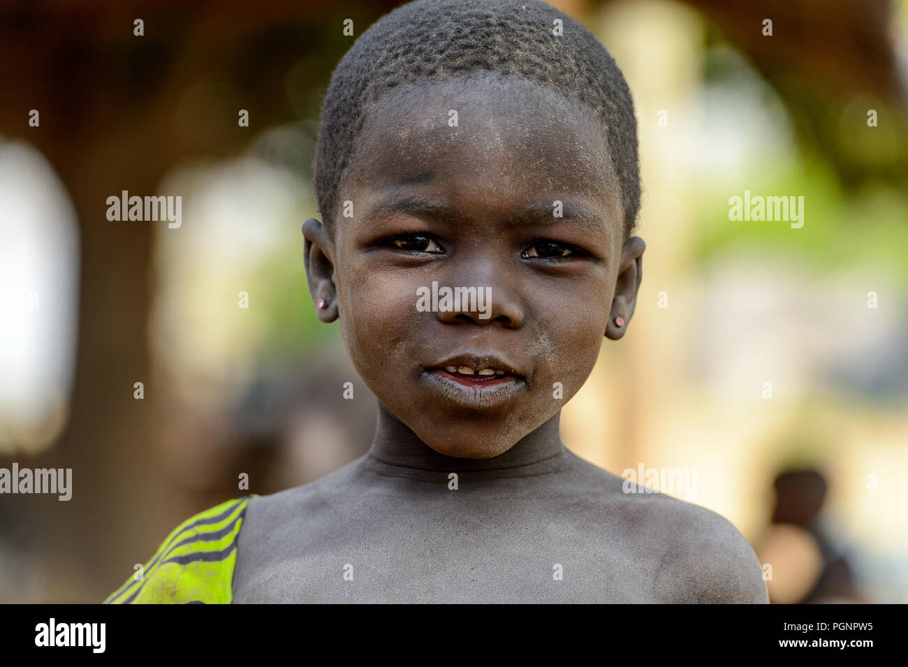GHANI, GHANA - JAN 14, 2017: Unidentified Ghanaian little soiled girl ...