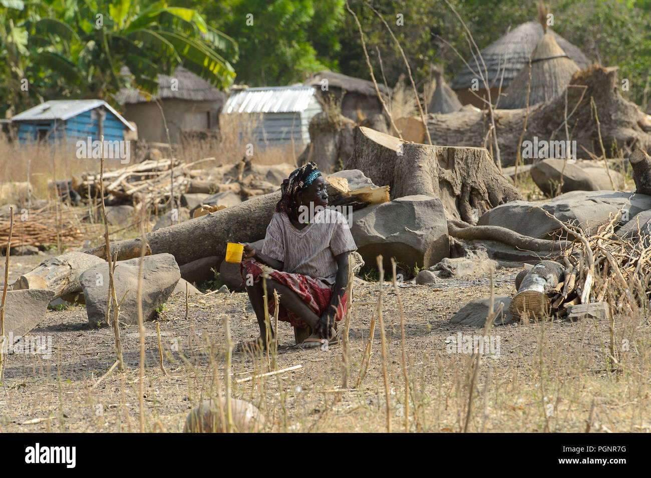 GHANI, GHANA - JAN 14, 2017: Unidentified Ghanaian woman holds a yellow ...