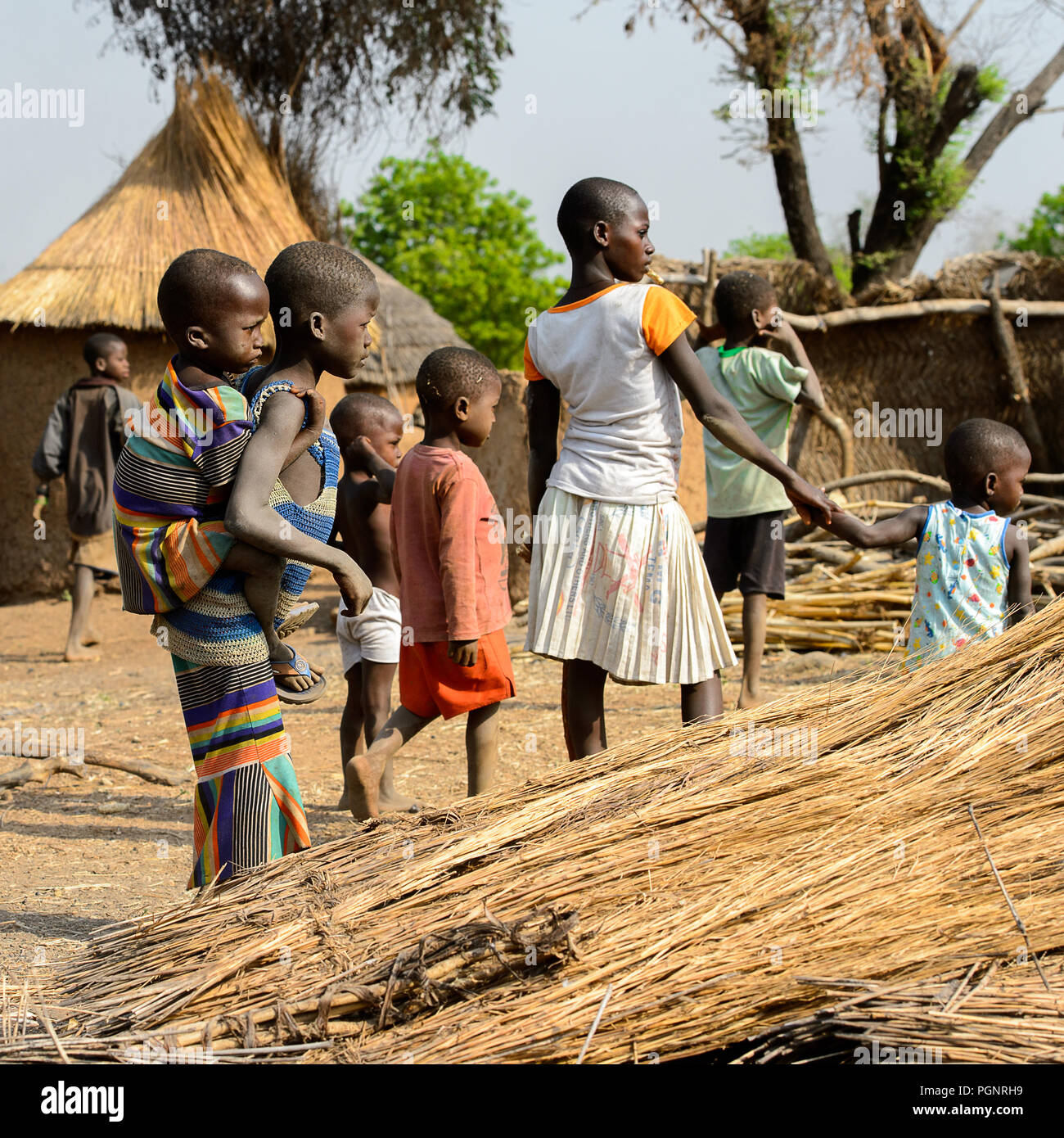 GHANI, GHANA - JAN 14, 2017: Unidentified Ghanaian little girl carries ...
