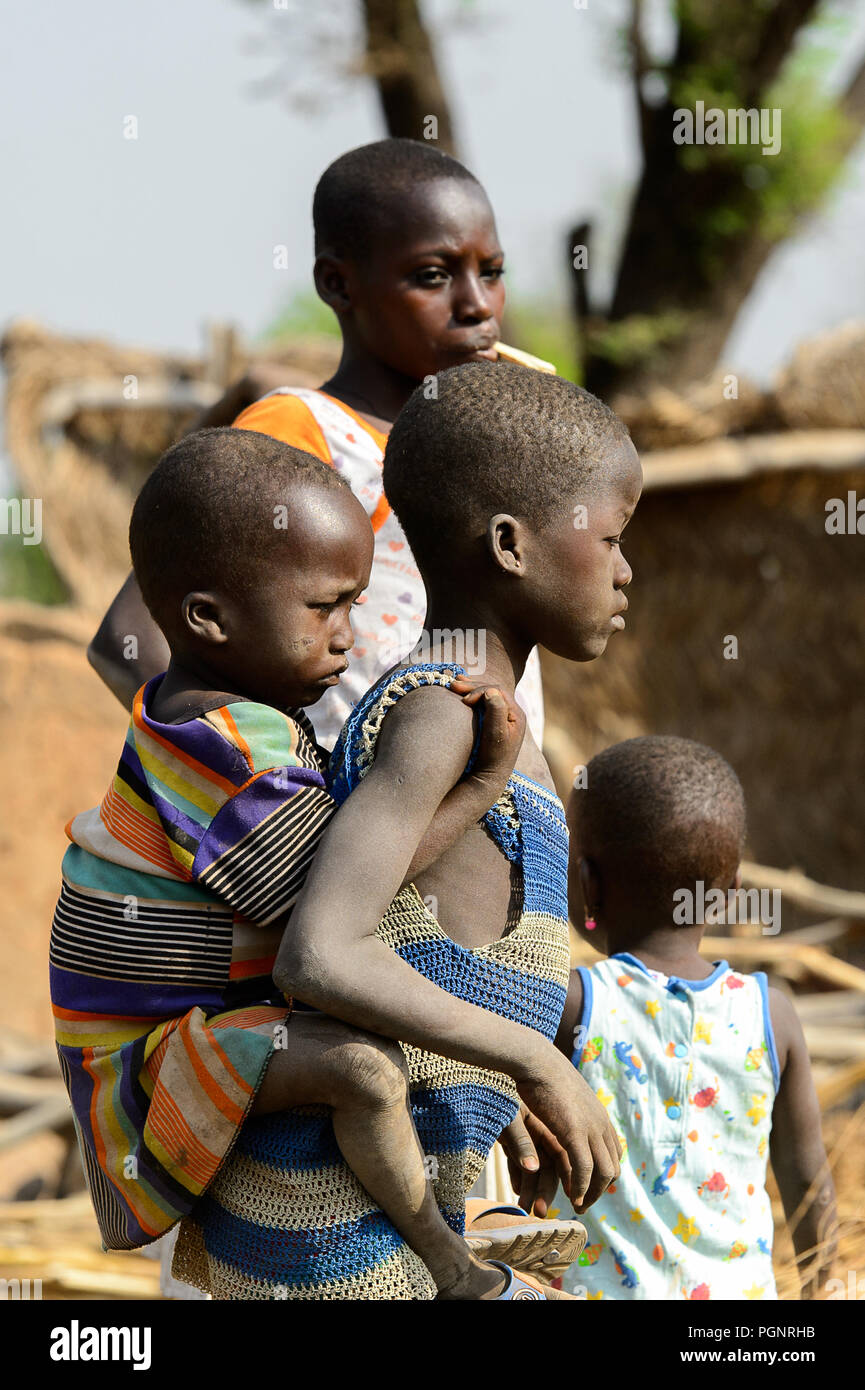 GHANI, GHANA - JAN 14, 2017: Unidentified Ghanaian little girl carries ...