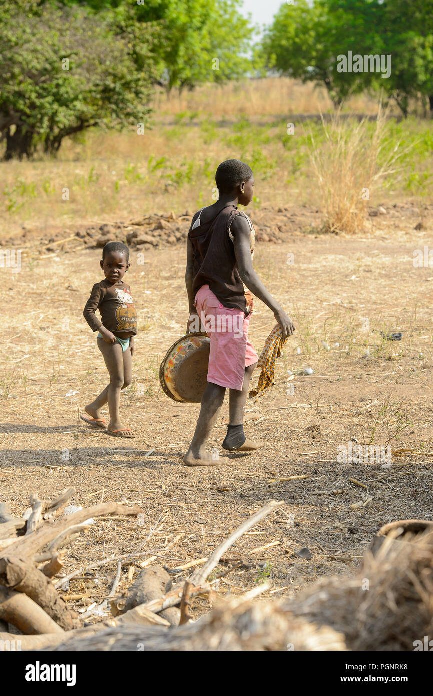 GHANI, GHANA - JAN 14, 2017: Unidentified Ghanaian woman walks with a ...