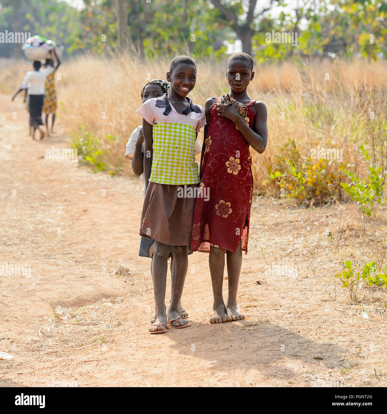 GHANI, GHANA - JAN 14, 2017: Unidentified Ghanaian children walk on the ...