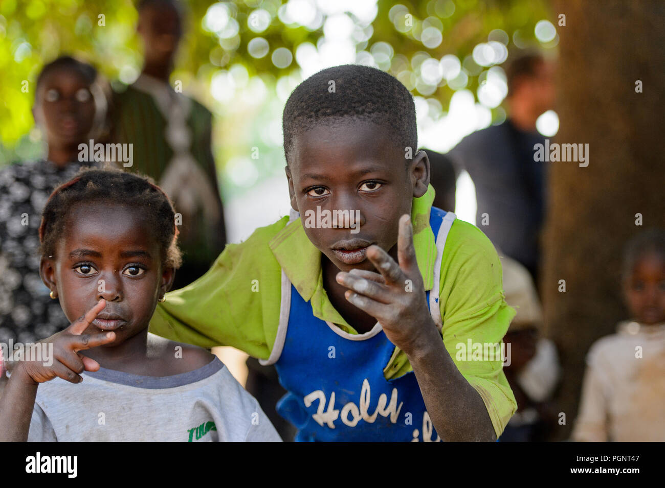 GHANI, GHANA - JAN 14, 2017: Unidentified Ghanaian children look ahead ...