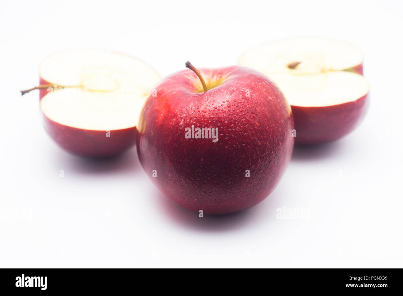 Apple and half apples isolated Stock Photo - Alamy