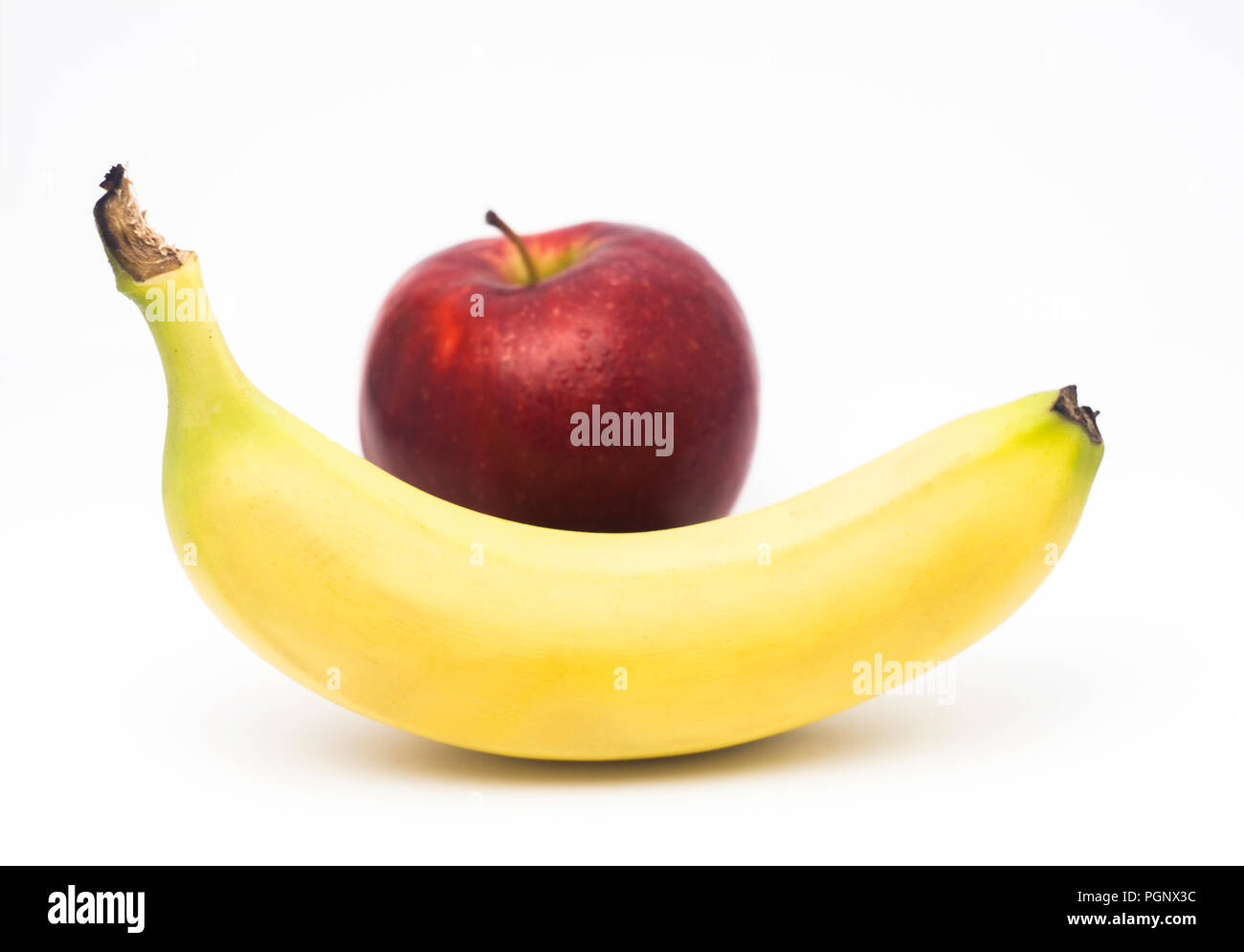 Apple and banana isolated Stock Photo - Alamy