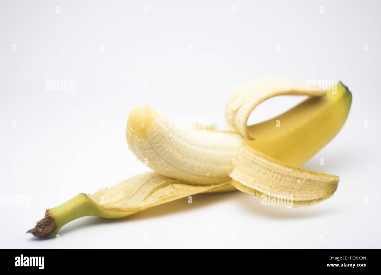 Single banana expanded Stock Photo - Alamy