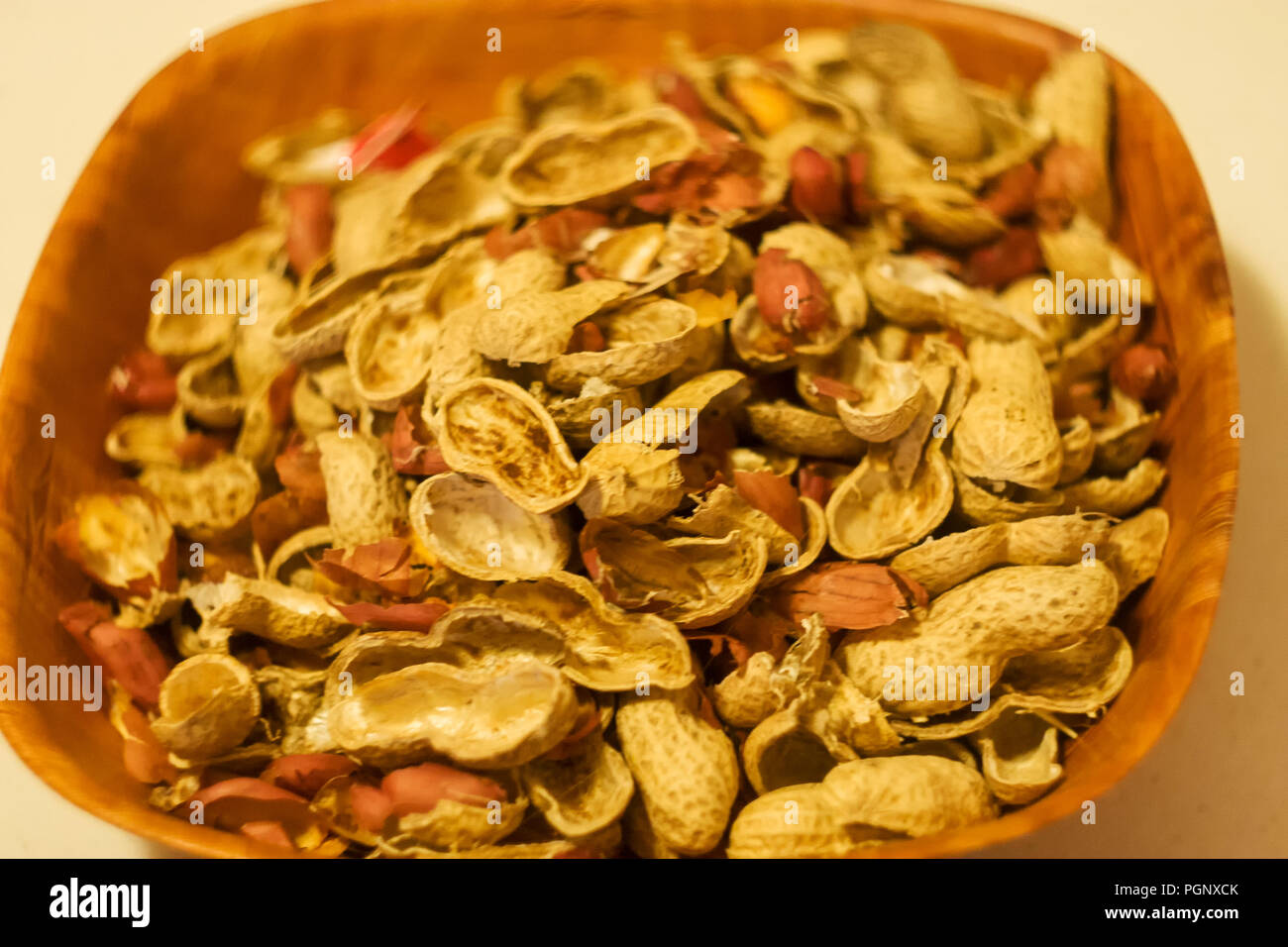 Peanuts and shells food background texture. Shallow dof Stock Photo - Alamy