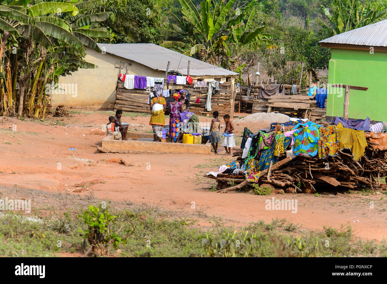 BRONG AHAFO, GHANA - JAN 15, 2017: Unidentified Ghanaian women wash ...