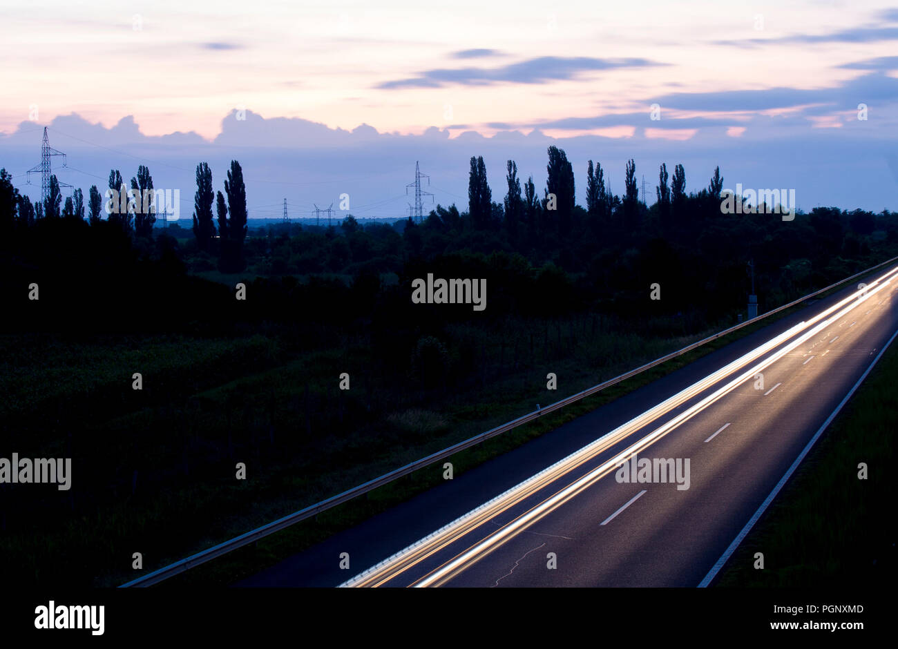 Hungarian highway at night showing vehicles lights, low shutter speed ...